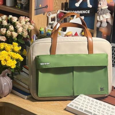 China TREND UNIVERSAL MEN'S AND WOMEN'S SENSHI SMALL FRESH LAPTOP BAG LIGHT, STYLISH AND WATERPROOF for sale