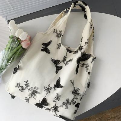 China EMBROIDERY BLACK BUTTERFLY CANVAS BAG LACE FAIRY LEISURE TRAVEL FEMALE BAG ART LARGE CAPACITY HUNDRED for sale