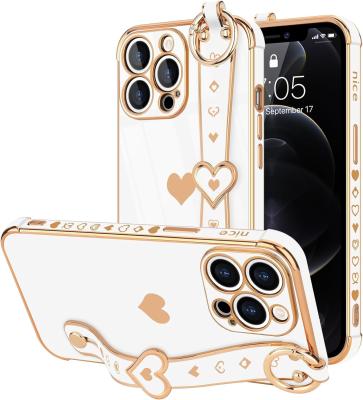 Cina iPhone 12 Pro Cute Love-Heart Plating Strap Phone Cover per donne ragazze Bling Silicone Camera Lens Protezione Bumper in vendita