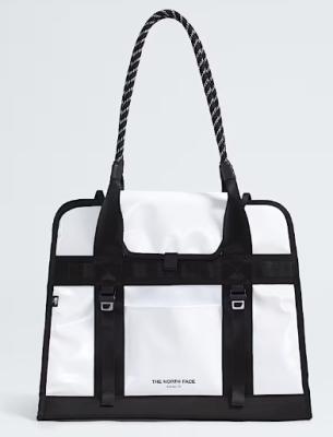 China Burly Tote Bag Designed with Rope Inspired Handles and Front Adjustable Straps Offering Large Secure Zip Pocket Key Hook and Topographic Lining for sale