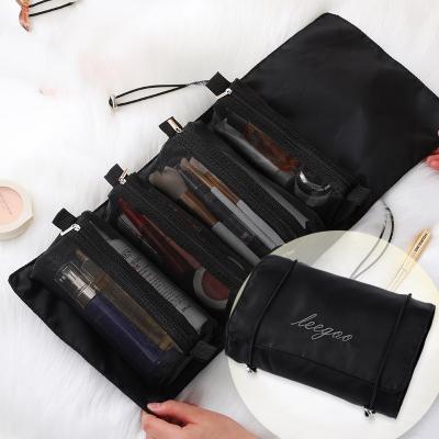 China Four In One Mesh Folding Makeup Wash Bag Travel Portable Makeup Brush Storage for sale