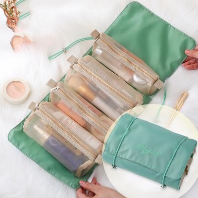 China Four In One Mesh Folding Makeup Wash Bag Travel Portable Makeup Brush Storage for sale