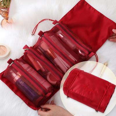 China Four In One Mesh Folding Makeup Wash Bag Travel Portable Makeup Brush Storage for sale