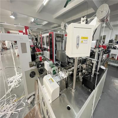 Cina kf94 mask automatic packaging machine 150pcs/min facial mask packaging machine in vendita