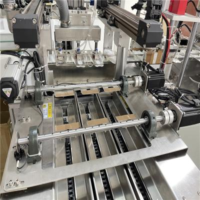 Cina High speed 150 pcs/min KF94 mask packaging machine printer automatic mask packaging machine in vendita