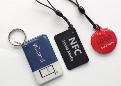 Cina 13.56mhz 40*25mm Tag NFC personalizzato MI-FARE Ultralight EV1 RFID Epoxy Card Per Parco di divertimenti / Gym Club / Controllo degli accessi in vendita