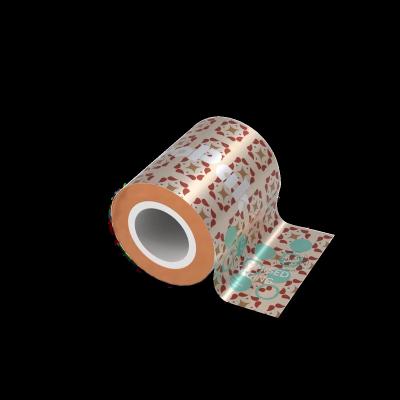 China Custom Printed Biodegradable Pe Paper Suger Coffee Pouch Roll Stock Film for Automatic Packaging for sale