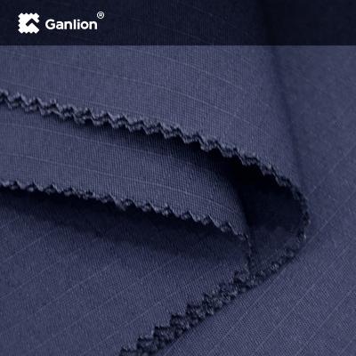 Cina Il cotone T400 del poliestere ha allungato il tessuto 215GSM degli abiti da lavoro molte volte lavabili in vendita