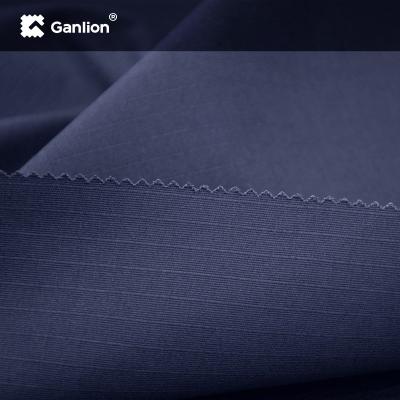 Cina Il cotone T400 del poliestere ha allungato il tessuto 215GSM degli abiti da lavoro molte volte lavabili in vendita
