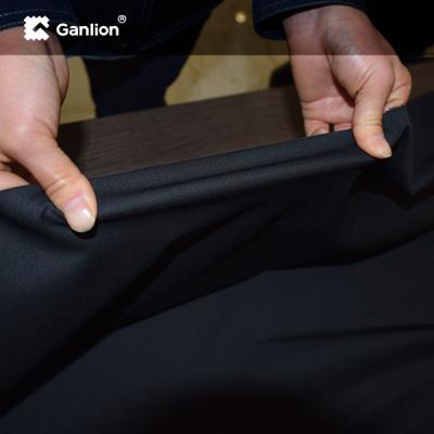 Cina Il poliestere nero XLANCE del cotone ha allungato le camice piene della manica del tessuto 235GSM degli abiti da lavoro in vendita