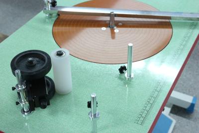 China Elastische tape oprol machine Gemakkelijk te bedienen plastic verpakkingstape machine voor kledingriem Te koop