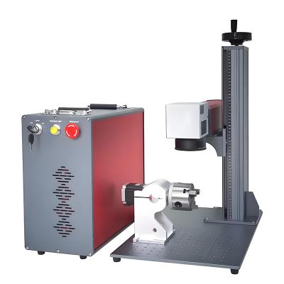 China 100W & 200W Split Mopa Fiber Laser Engraver & Marking Machines Glass & Gemstone CNC Machine Suitcase Supports AI DXF PLT Formats for sale