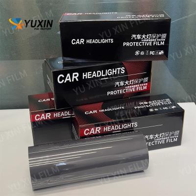 Cina Film per fari TPU a fumo nero per auto 0.3x15M Film di protezione UV anti-UV per fari in vendita