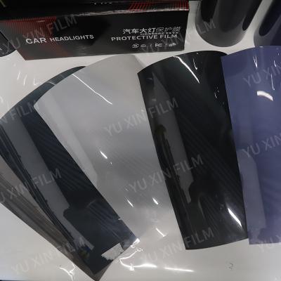 Cina Film per fari TPU a fumo nero per auto 0.3x15M Film di protezione UV anti-UV per fari in vendita