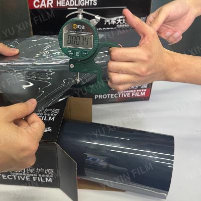 Cina Pellicola per fari in TPU nero chiaro, fanali posteriori, antigraffio, per fari auto, dimensioni personalizzate in vendita