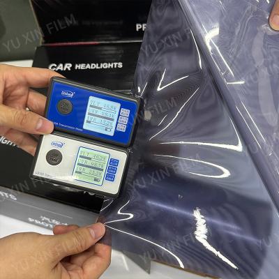 Cina OEM TPU grigio chiaro film proiettore auto luminoso lucido rimovibile per la protezione in vendita