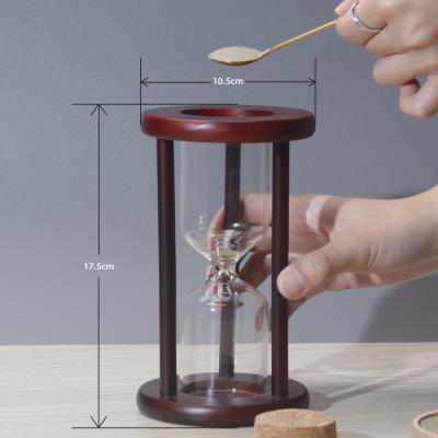 Cina clessidra a caricamento automatico fatta a mano di legno degli ornamenti del mestiere del regalo delle sabbie mobili della bottiglia del temporizzatore di legno decorativo creativo DIY dell'imbuto in vendita