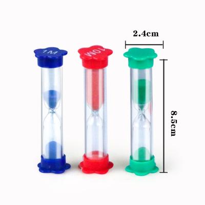 Cina Temporizzatore basso della sabbia della clessidra del temporizzatore di forma di plastica variopinta del fiore per istruzione dei bambini in vendita