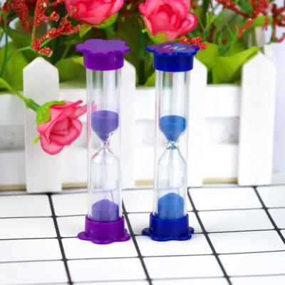 Cina Temporizzatore basso della sabbia della clessidra del temporizzatore di forma di plastica variopinta del fiore per istruzione dei bambini in vendita