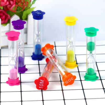 Cina Temporizzatore basso della sabbia della clessidra del temporizzatore di forma di plastica variopinta del fiore per istruzione dei bambini in vendita