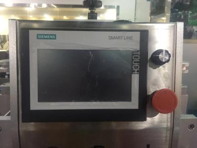 Cina Torsione automatica della fabbrica cosmetica fuori dalla tappatrice d'avvitamento del coperchio della bottiglia dello sciampo della fabbrica della macchina del cappuccio in vendita