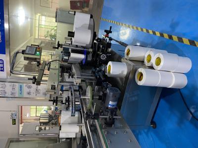 Cina Il doppio adesivo rotatorio parteggia etichettatrice per la bottiglia di vetro piano della lozione in vendita