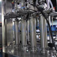 China 4 Nozzles Automatic Liquid Filling Machine for Plastic Bottles 100-1000ml 3KW for sale