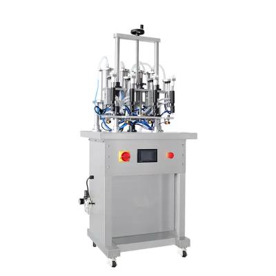 Cina Profumo automatico di vuoto di 4 teste che pesa materiale da otturazione che fa il manuale della macchina per la bottiglia in vendita