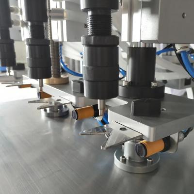 Cina Profumo automatico di vuoto di 4 teste che pesa materiale da otturazione che fa il manuale della macchina per la bottiglia in vendita