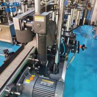 China Fully Automatic Double Side Labeling Machine For Flat Round Bottle for sale
