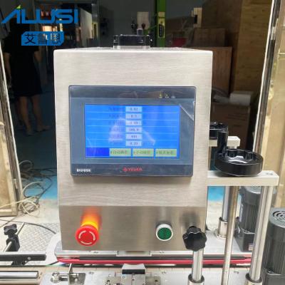 Cina tappatrice automatica della vite del contagoccia dei cappucci dello spruzzo di Juice Essential Oil Pump Head della tappatrice della bottiglia 70db in vendita