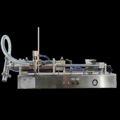 Cina Riempimento di bottiglie automatico orizzontale per riempitrice pneumatica di liquidi in acciaio inossidabile in vendita