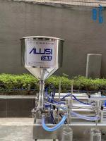 China Horizontal Two Nozzle Piston Liquid Filling Machine 30L Hopper 316L Stainless Steel for sale
