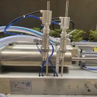 China 100-1000ml Double Head Horizontal Semi Automatic Liquid Filling Machine 316L Stainless Steel for sale