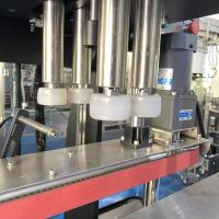 China 2000 ~ 3500 b/H Pneumatic Plastic Bottle Capping Machine Electrical Control Movement for sale