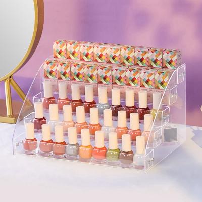 Cina Scalinata Display 5 6 Livello Cosmetico Bottiglia Rack Organizzatore Vitrina Conteggio Polverizzatore di unghie Mensola di plastica in vendita