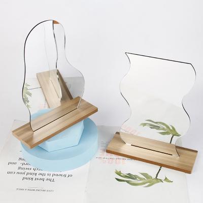 China Curvy Portable Lighted Makeup Mirror Wood Stand For Vanity for sale