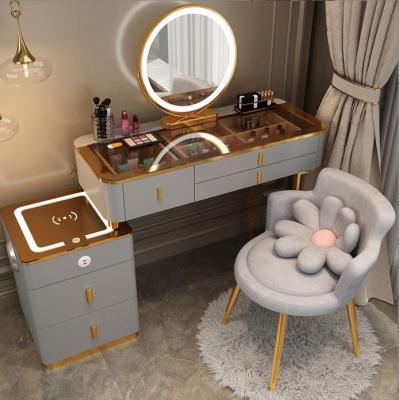 China Smart Furniture Modern Simple Multi Functional Princess Dressing Table Side Cabinet Vanity With Mirror Chair Smart Table for sale