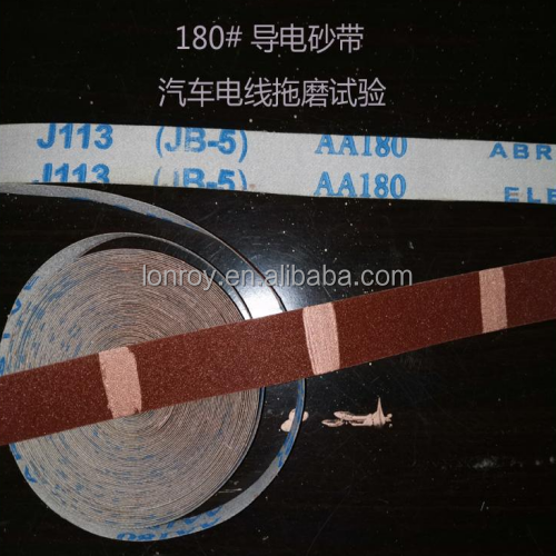 Side view of wire wear resistance tester showing load mechanism