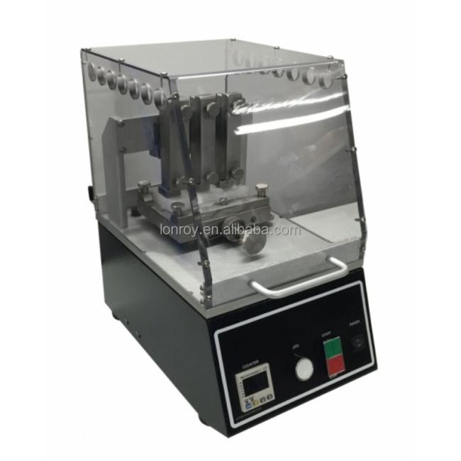 BS 1006 DIN 53 Leather Rubbing Color Fastness Tester showing three testing stations