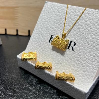 China factory cheap price High Quality Four Leaf Lock Bag 18K Gold Pendant Design Meaningful Keepsake 18K Gold Pendant for sale