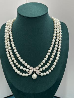 China Hot New Products Bowknot Luxurious Pendant Classic Vintage Women Wholesale White Natural Pearl Pendant Multi Layer Necklace for sale
