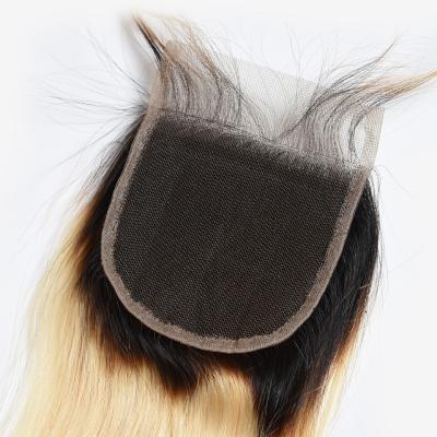 Cina capelli umani puri diritti del grado 100% di colore 1b/613 9a dei capelli 4x4 della chiusura brasiliana del pizzo in vendita