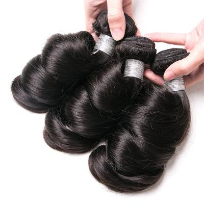 Cina Pacchi peruviani reali dei capelli umani, capelli peruviani molli di Wave dell'ente sciolto in vendita