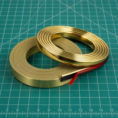 China Gold PVC Edge Banding Strip with Matte Metallic Finish 13mm Width 2.8mm Height for Furniture Edge Trim for sale
