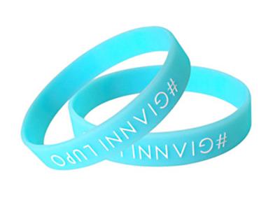 Cina bande del braccialetto impresse logo della gomma di silicone di colore solido 3D per i regali promozionali in vendita