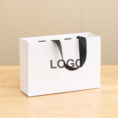中国 Product Custom Branded Boutique Carrier Shopping Bags with Logo and Flexiloop Handle 販売のため
