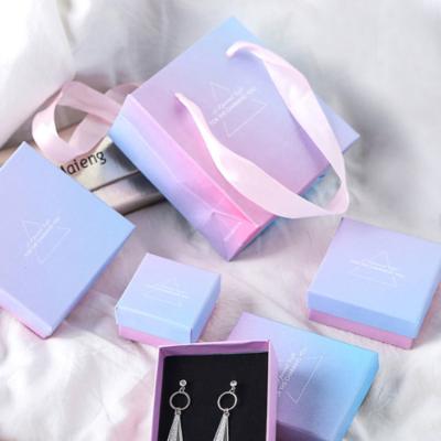 China Recycled Materials Customized Scented Paper Bags for Macaron Jewelry Watch Luxury Box for sale