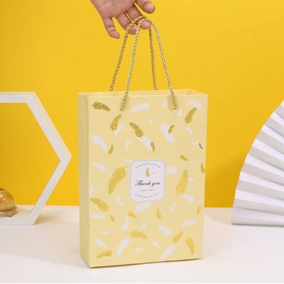 China Recycled Materials Customized Scented Paper Bags for Macaron Jewelry Watch Luxury Box for sale