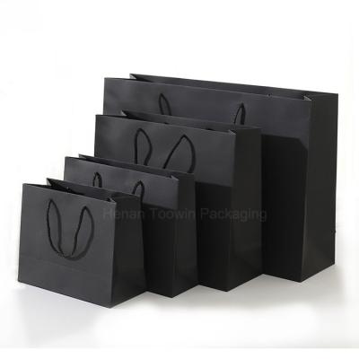 Cina Customized Flexiloop Handle Cardboard Shopping Packaging Paper Bag With Logo For Your in vendita